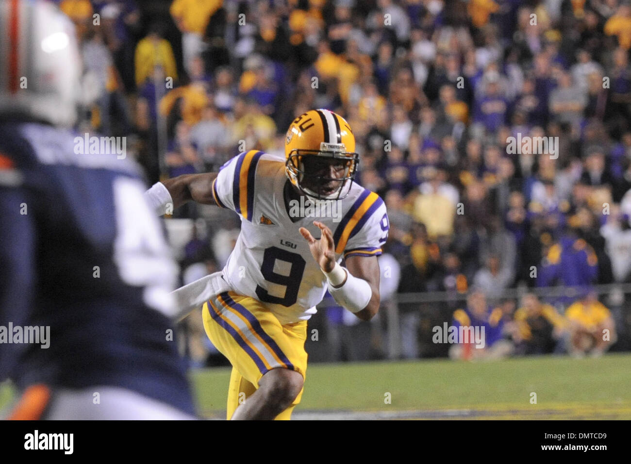 LSU quarterback, #9 Jordan Jefferson, scrambles during Saturday nights ...
