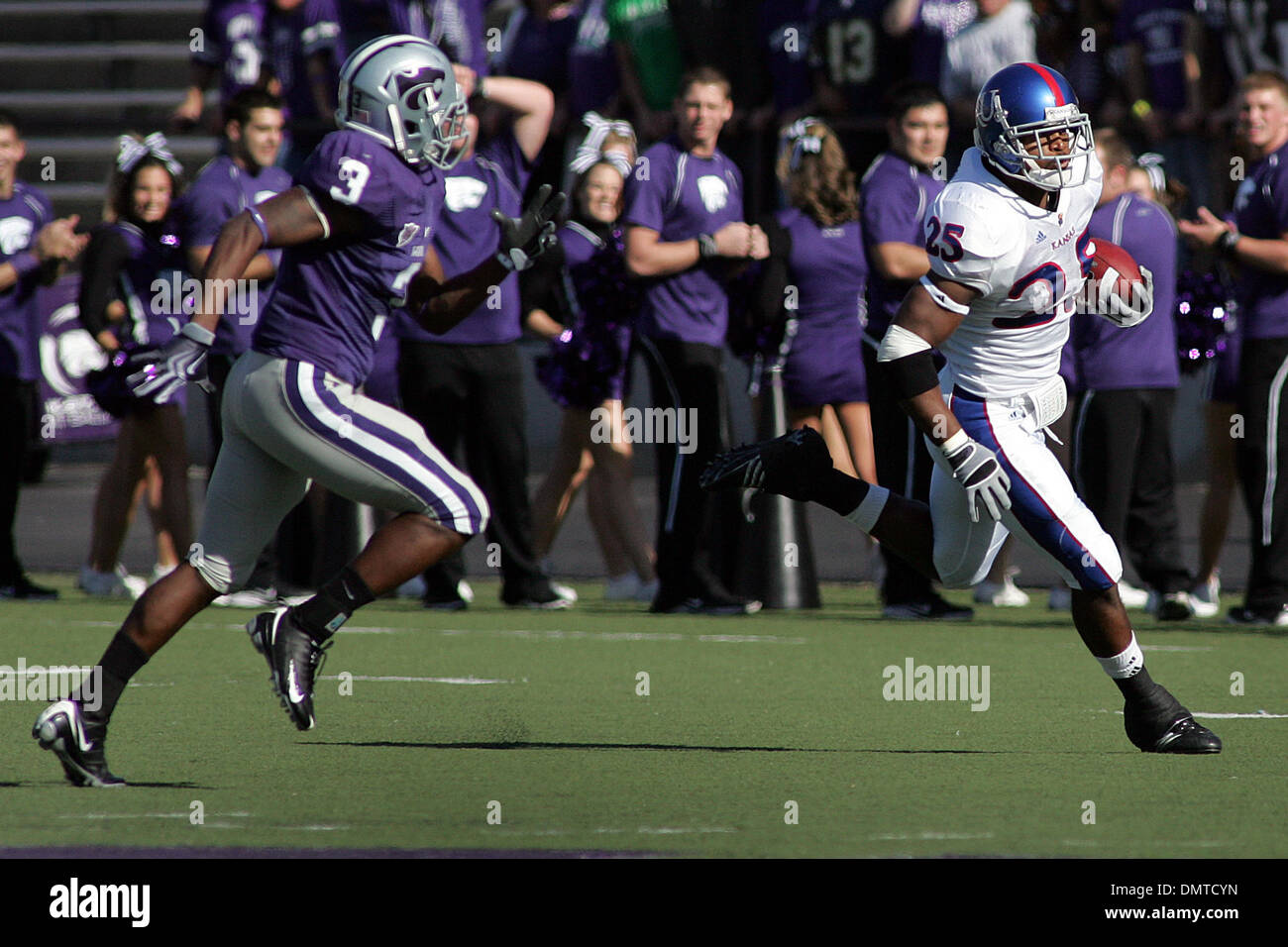 Kansas safety Darrell Stuckey (25) dodges Kansas State defensive back ...