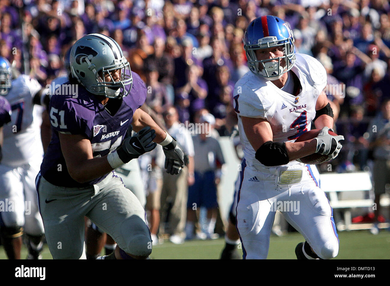 Kansas running back Jake Sharp (1) dodges Kansas State linebacker Ulla ...