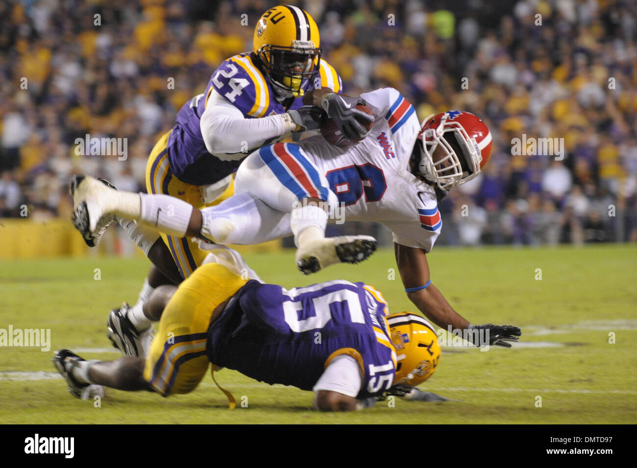 La. Tech wide receiver, #6 Phillip Livas, is brought down by LSU ...