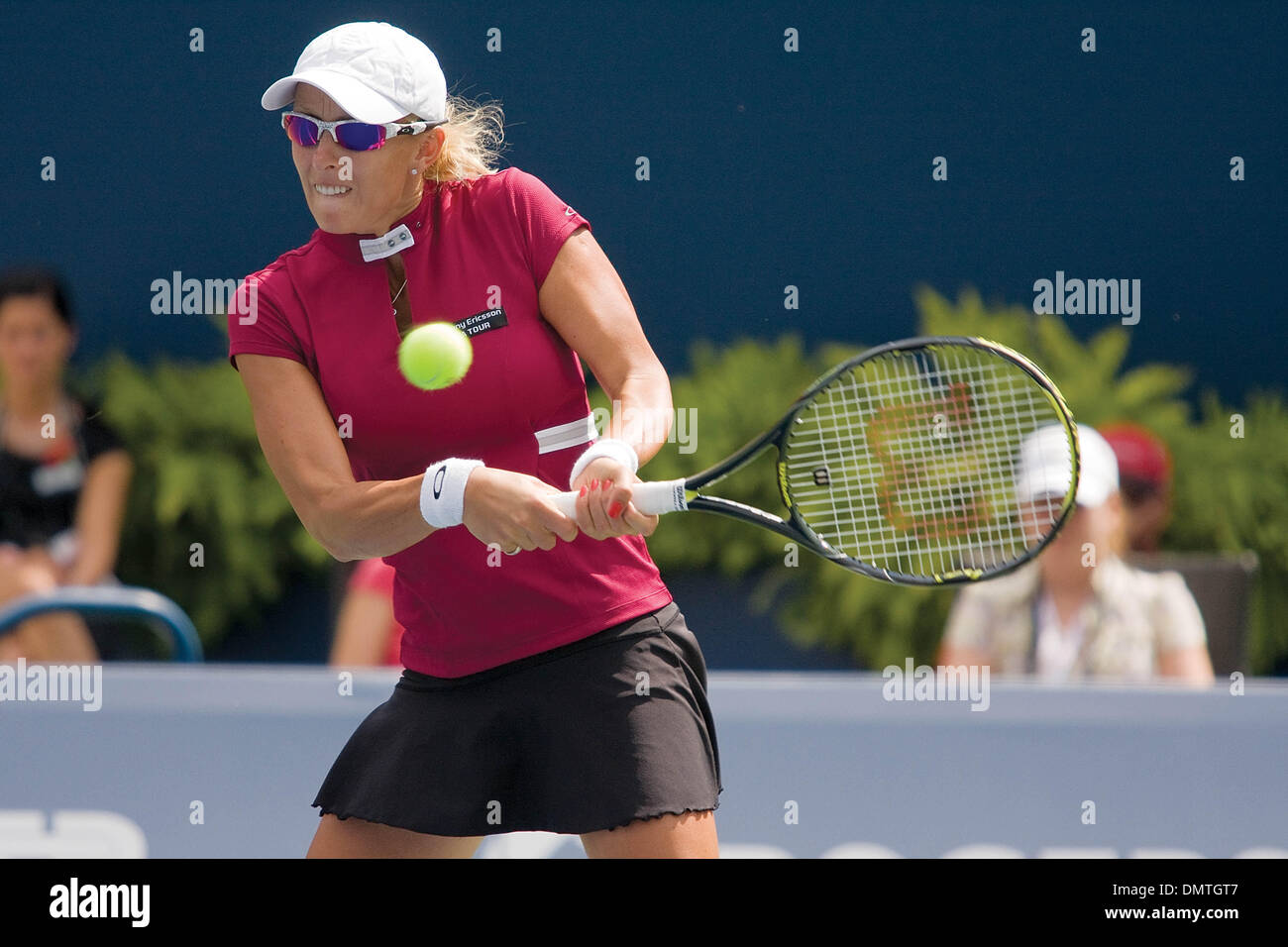 Anastasia Rodionova hits a backhand return to her opponents Cara Black ...