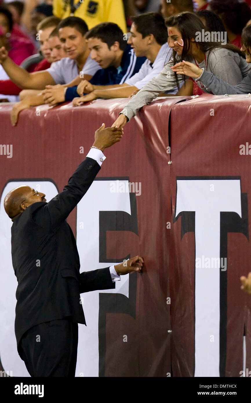 Philadelphia Mayor Michael Nutter shaking hands with fans in the stands ...