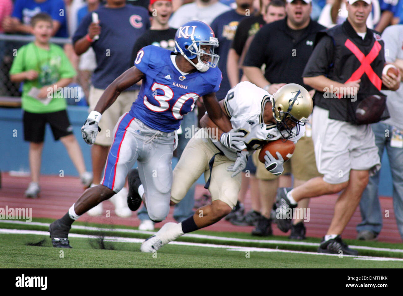 Northern Colorado wide receiver Alex Thompson (18) is covered by Kansas ...