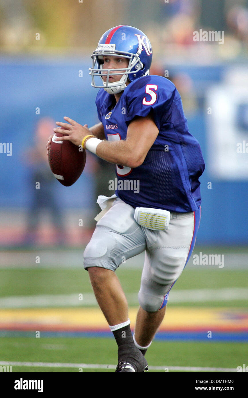 Kansas quarterback Todd Reesing (5) looks to pass during game action in ...