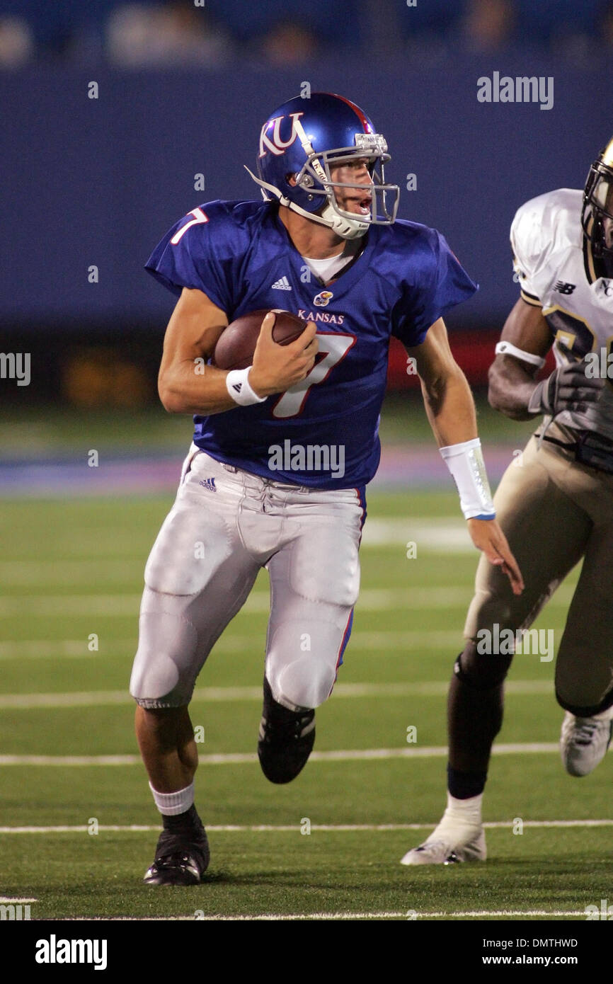 Kansas quarterback Kale Pick (7) scrambles to gain yardage during game ...