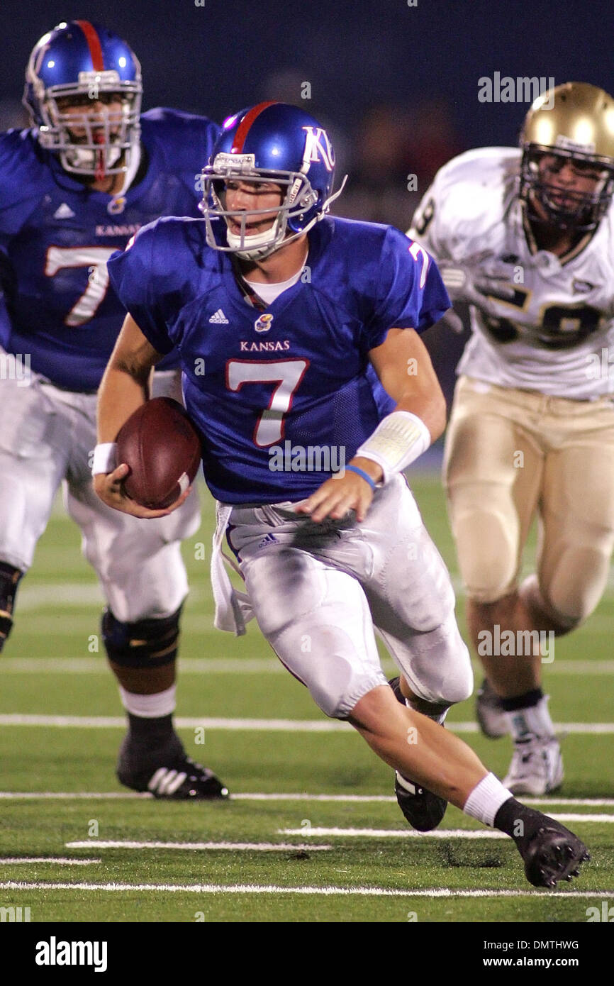 Kansas quarterback Kale Pick (7) scrambles to gain yardage during game ...