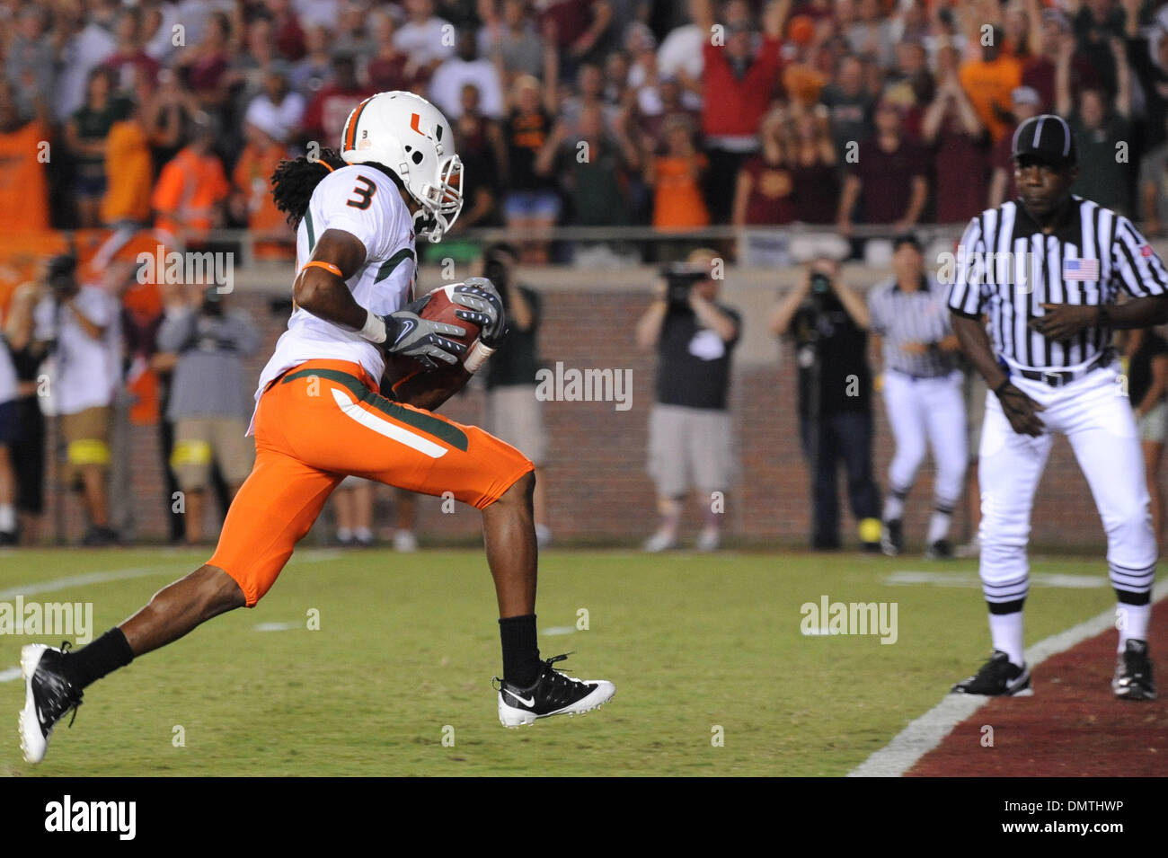 Miami receiver, Travis Benjamin, scores a touchdown during Monday ...