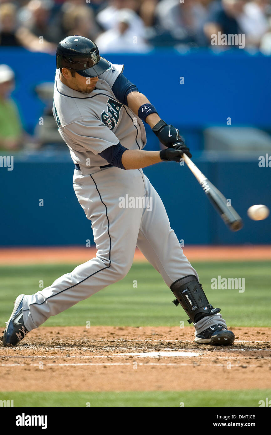 Seattle Mariners third baseman Matt Tuiasosopo #27 hits a ball off the ...