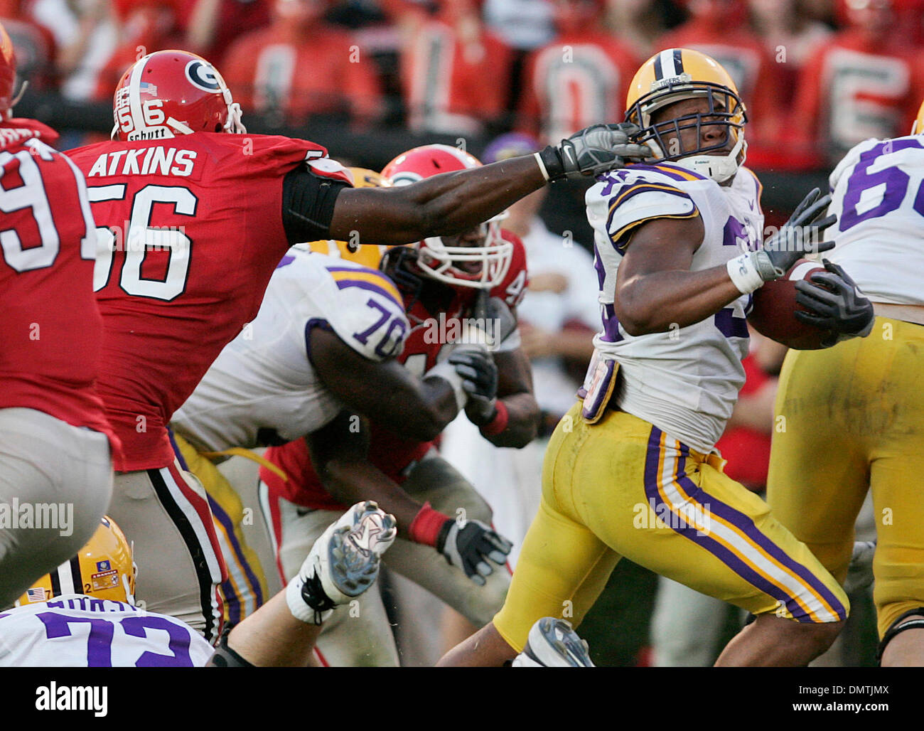 LSU running back Charles Scott (32) is facemasked by Georgia defensive ...