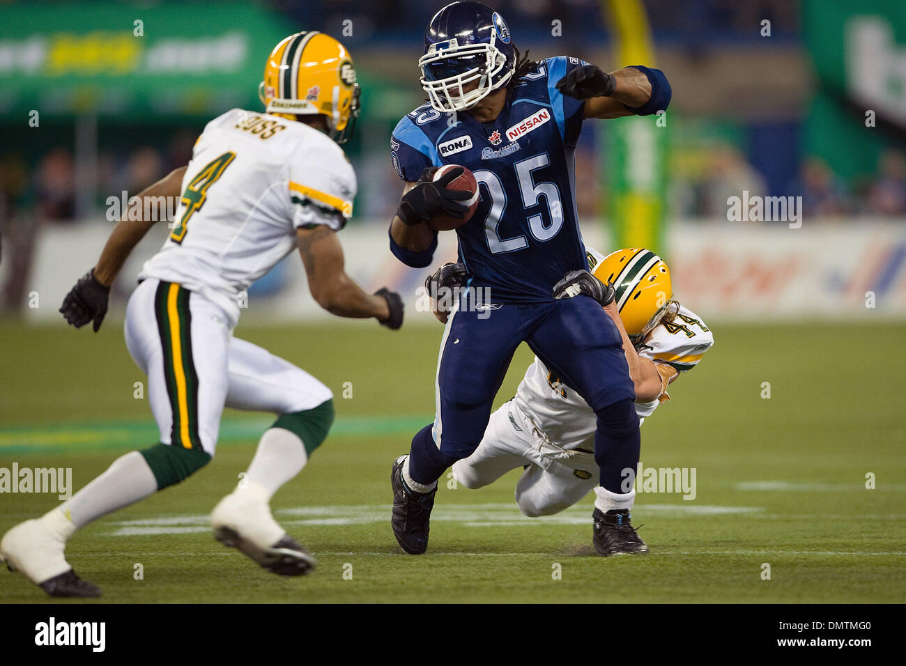Edmonton Eskimos linebacker Mark Restelli #44 puts the grab on Toronto ...