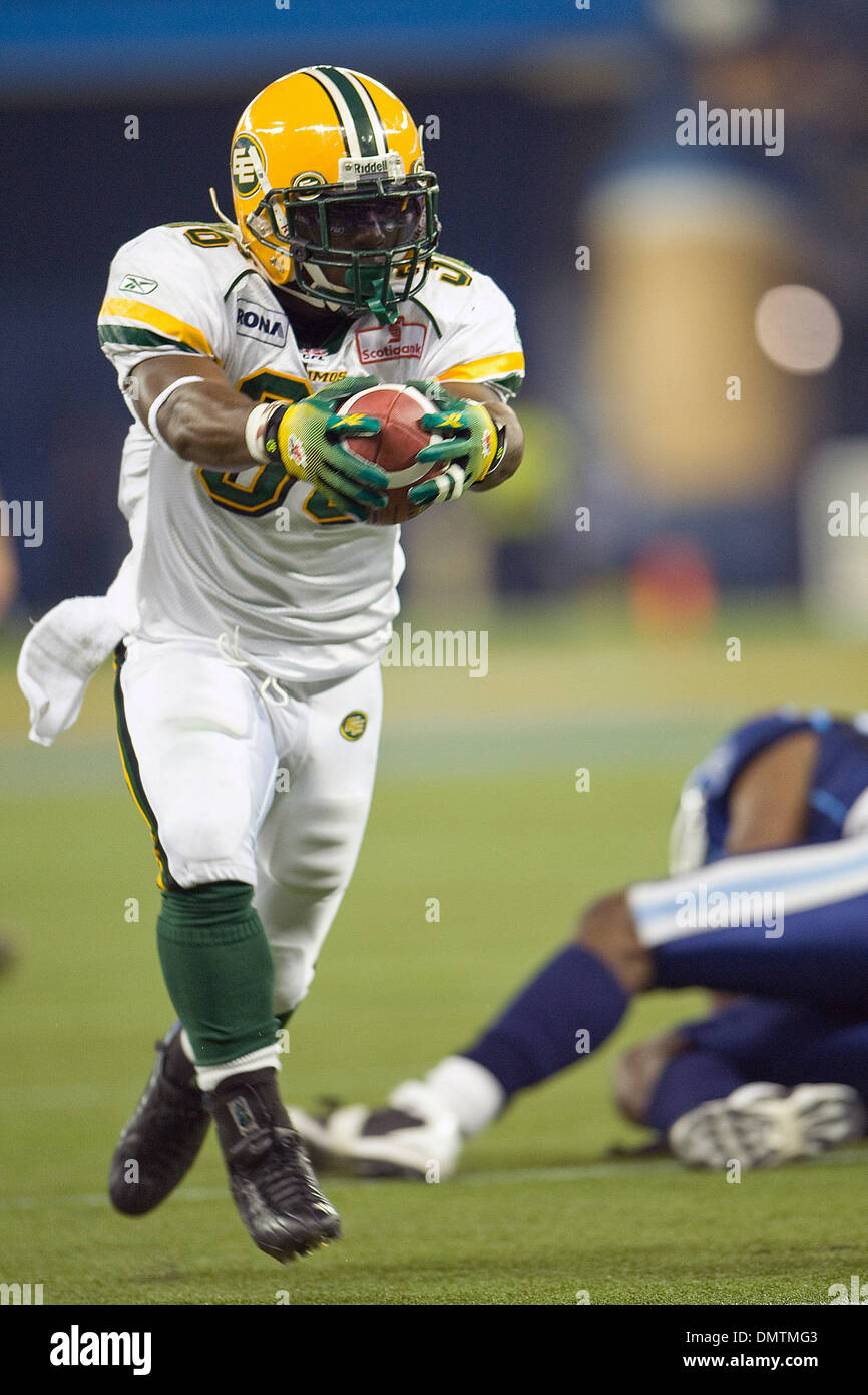 Edmonton Eskimos running back Arkee Whitlock #36 drives in for a ...