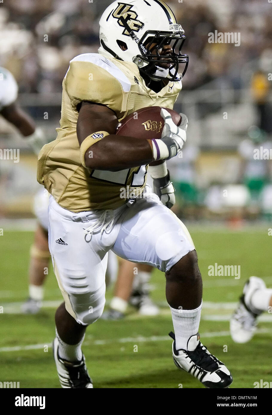 UCF Knights JOnathan Davis #27 rushing against the Marshall Thundering ...