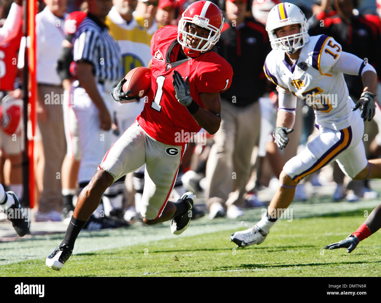 Georgia freshman defensive back Branden Smith (1) takes a ball around ...