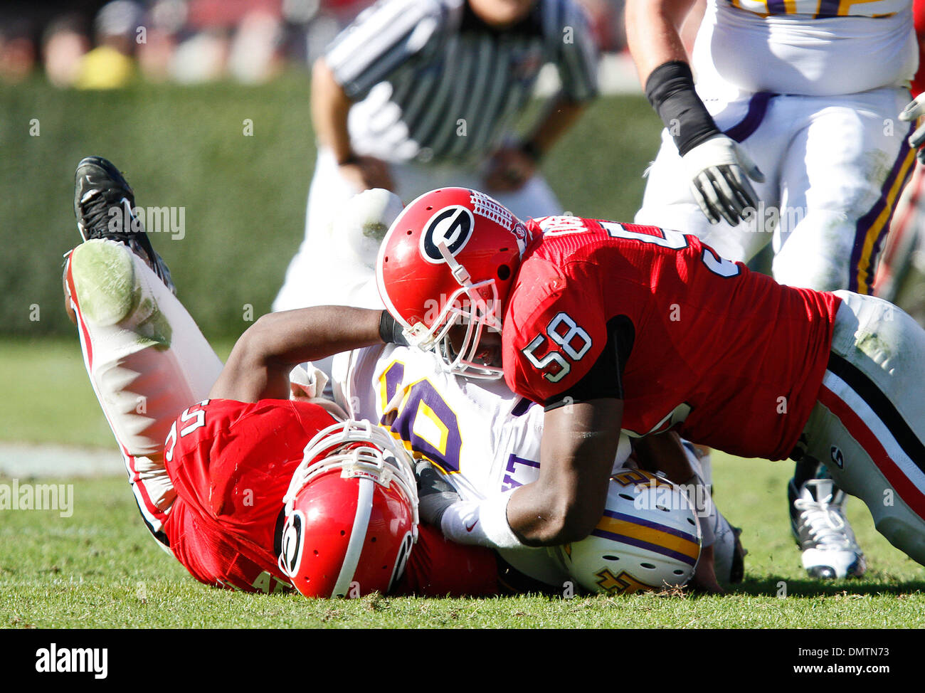 Tennessee Tech quarterback Tre Lamb (9) is sacked by Georgia senior ...