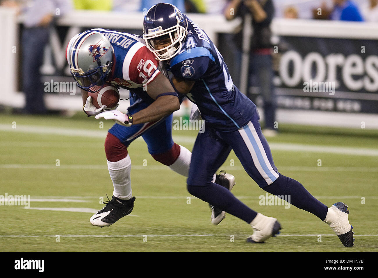 Toronto Argonauts corner back Dovonte Edwards #24 tackles Montreal ...