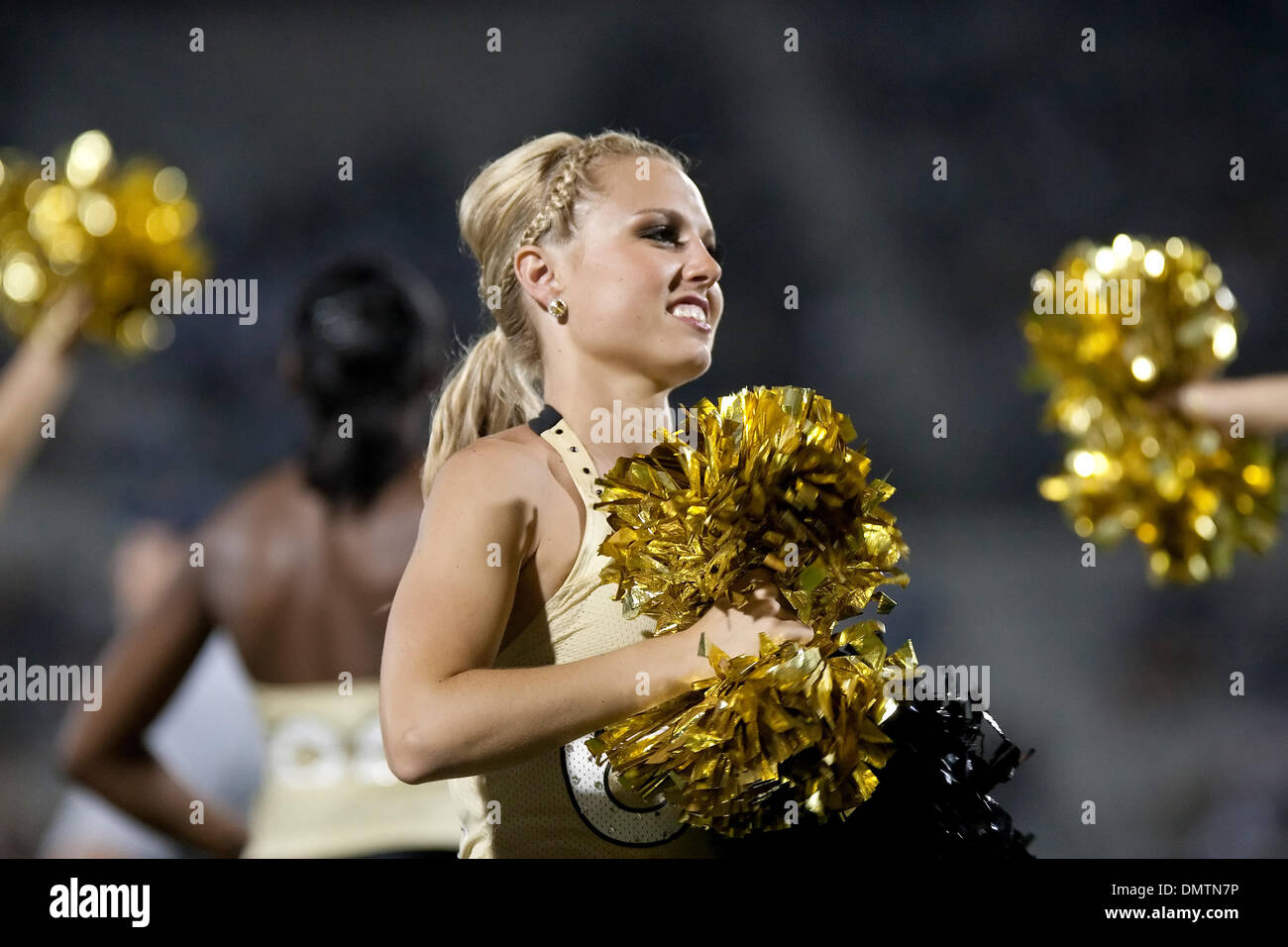 UCF Knights cheerleaders and the Marshall Thundering Herd in this ...
