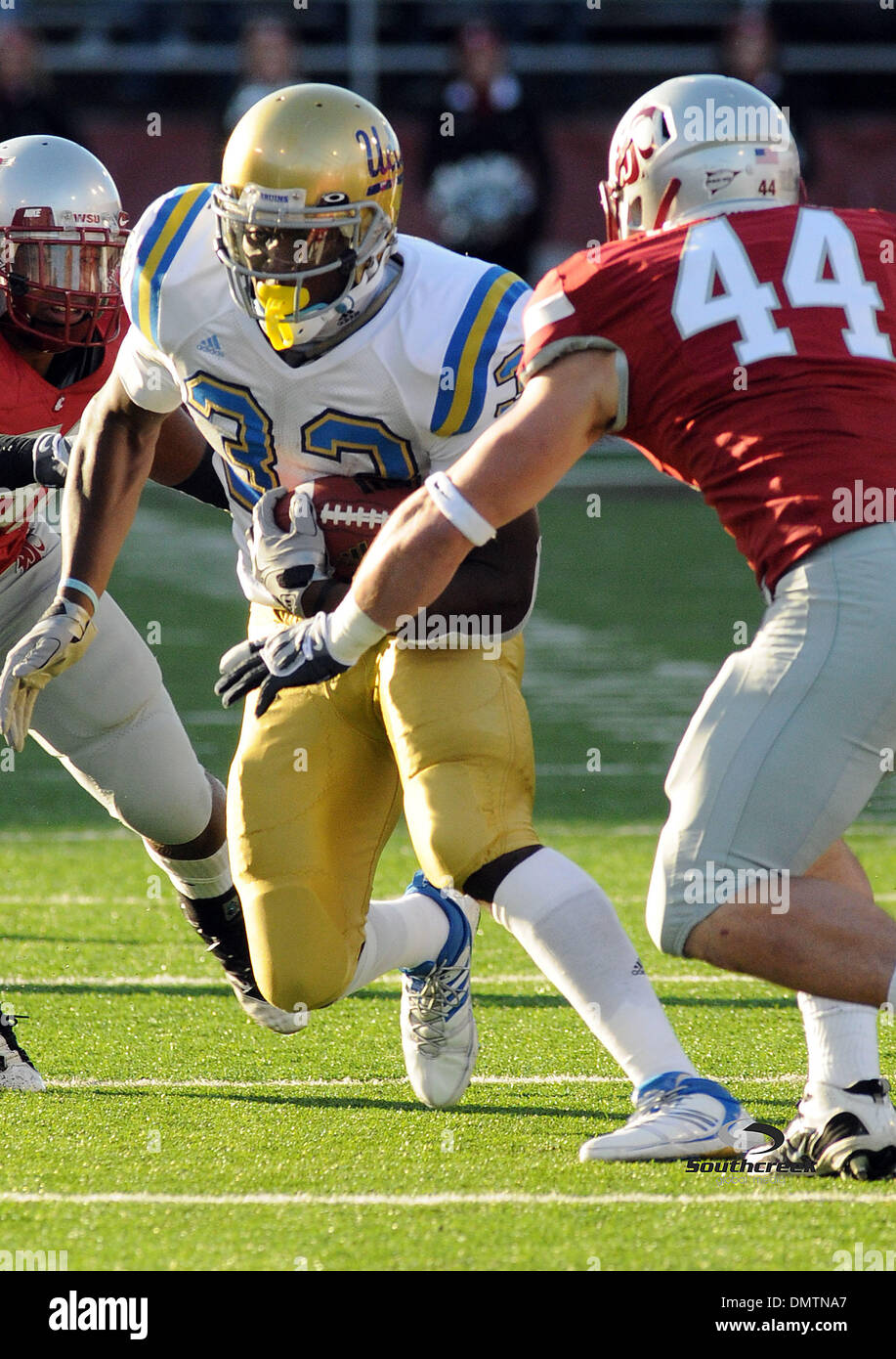 UCLA's Derrick Coleman (33) tries to get around the corner with ...