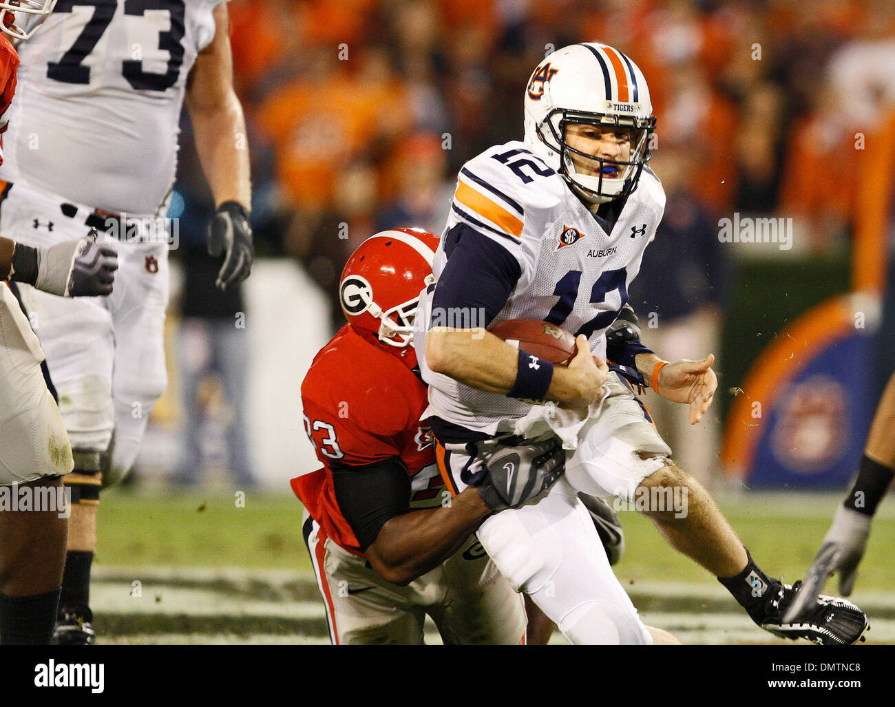 Auburn quarterback Chris Todd (12) is sacked by Georgia defensive end ...