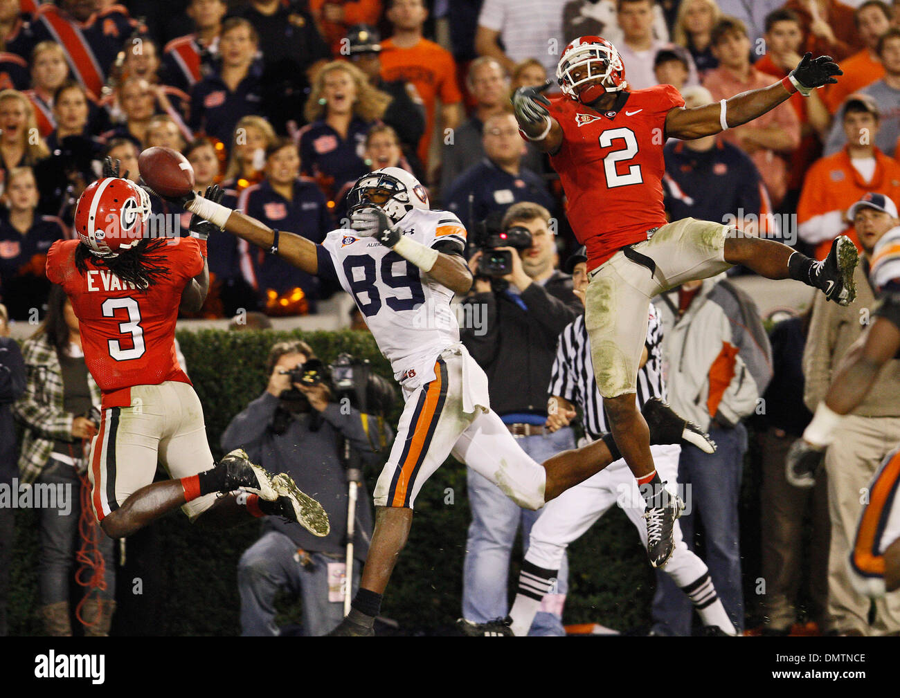 Georgia defensive backs Bryan Evans (3) and Brandon Boykin (2) break up ...