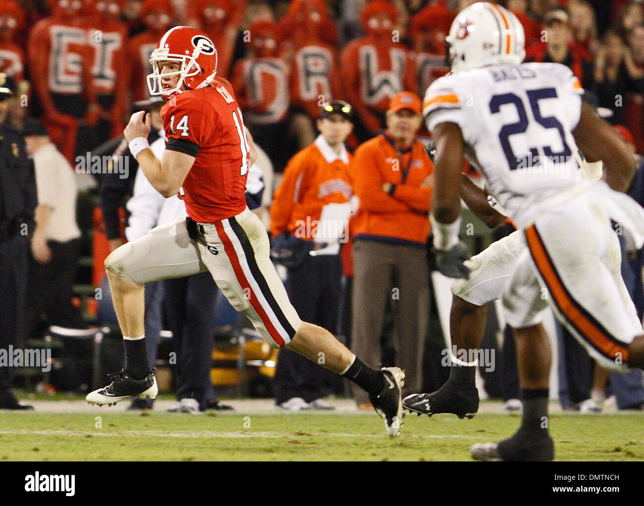 Georgia quarterback Joe Cox (14) scrambles for a 17 yard gain at the ...