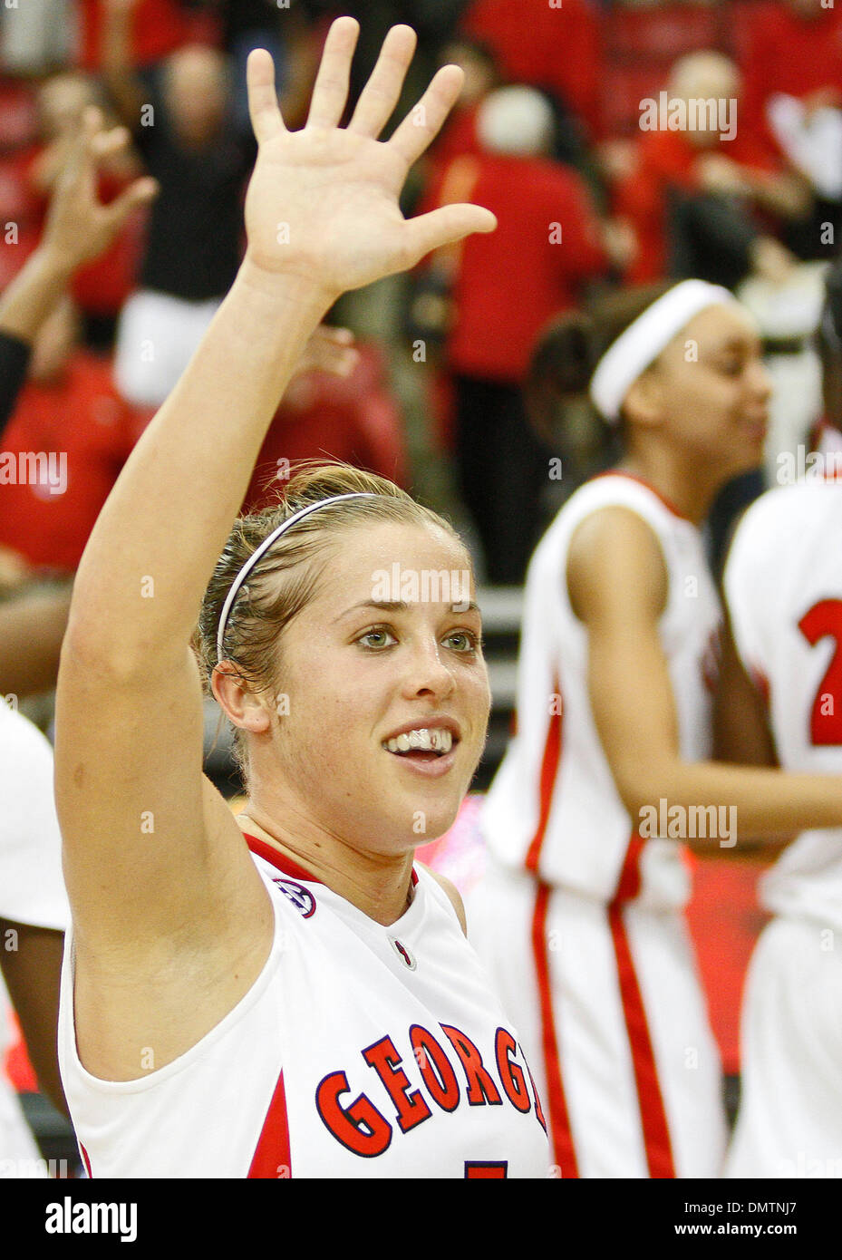 Georgia guard Ashley Houts (1) waves to the crowd after a win in the ...