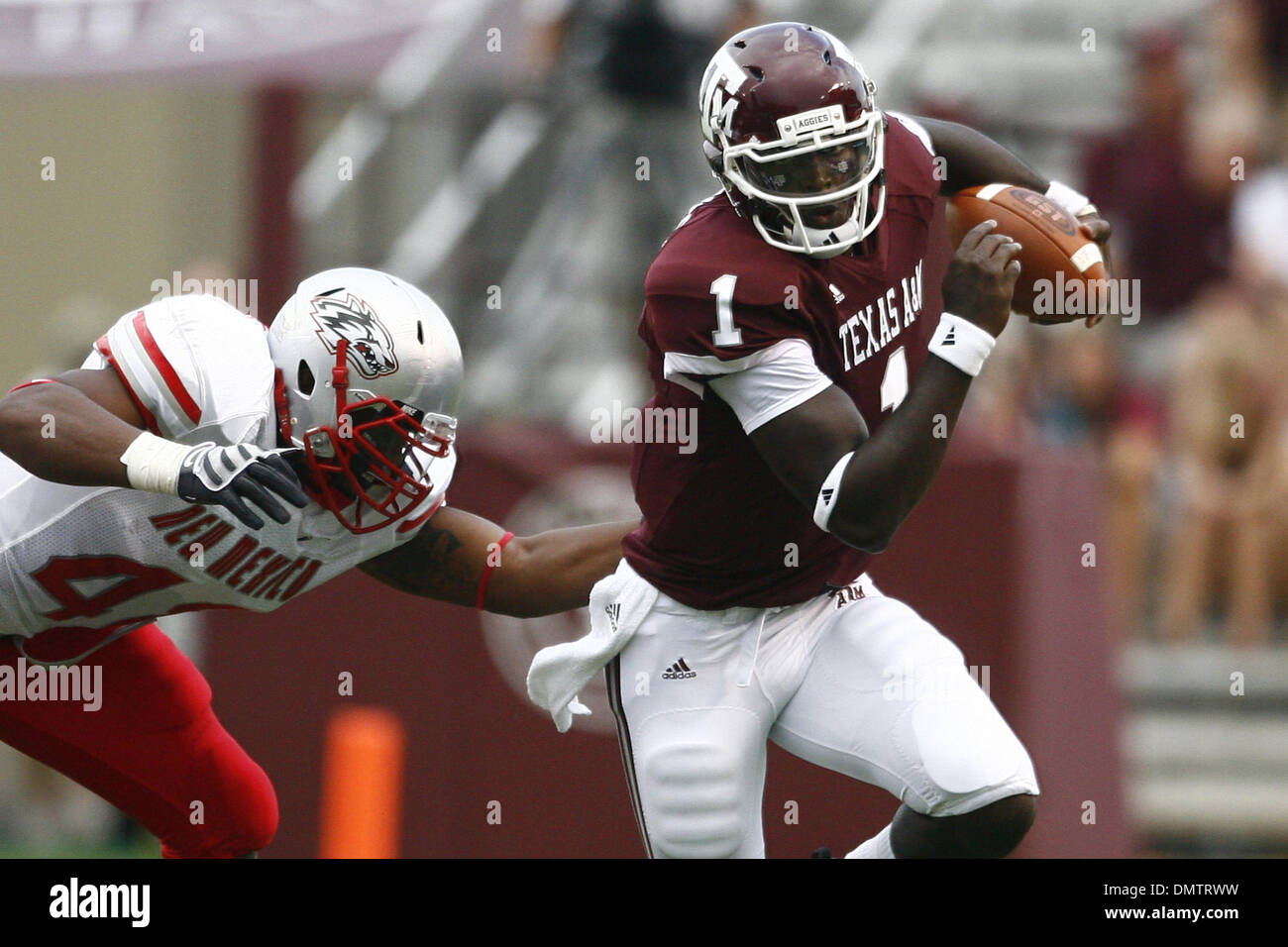 Jerrod Johnson (#1) of the Texas A&M University Aggies narrowly escapes ...
