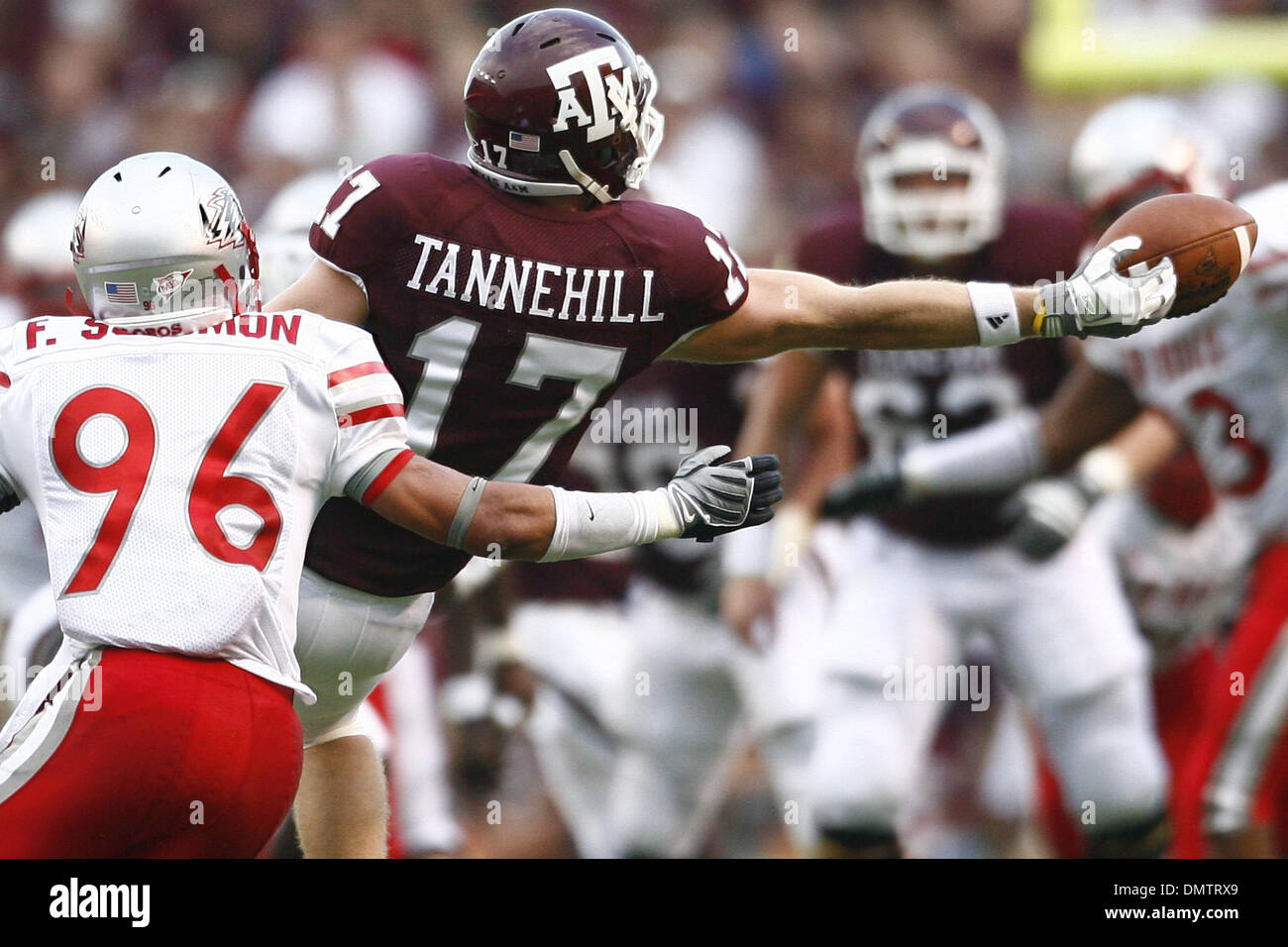 Ryan Tannehill (#17) of the Texas A&M University Aggies stretches to ...