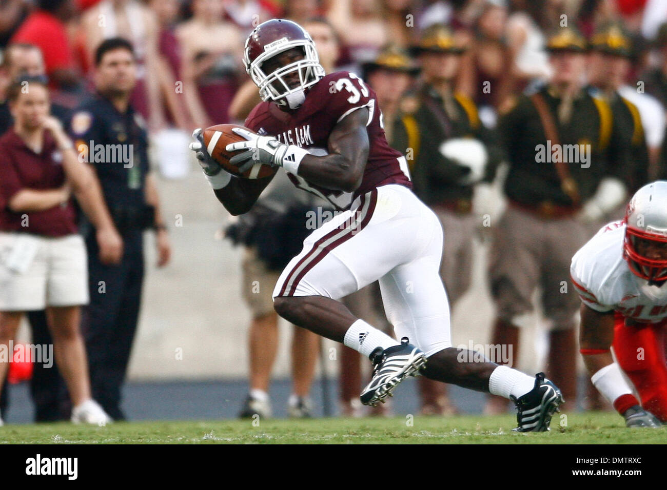 Christine Michael (#33) of the Texas A&M University Aggies breaks a ...