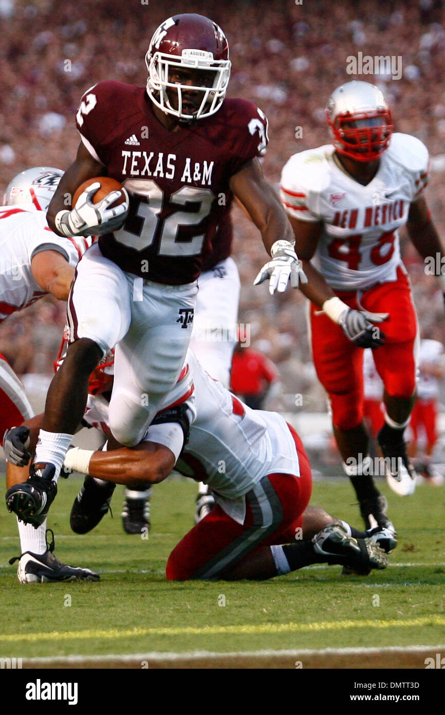 Cyrus Gray (#32) of the Texas A&M University Aggies breaks through the ...