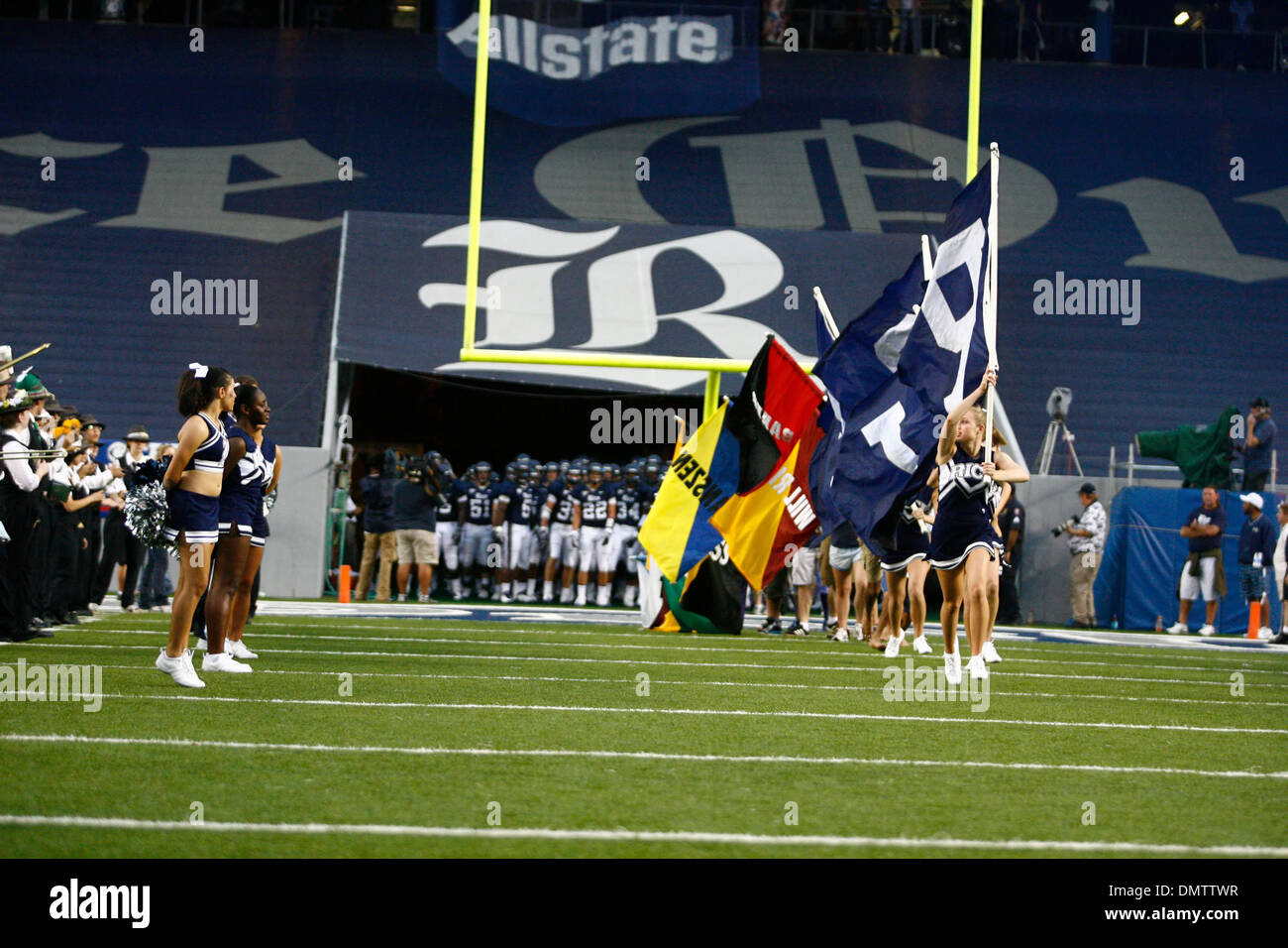Rice Cheerleaders lead the team onto the field. The Tulsa Golden ...