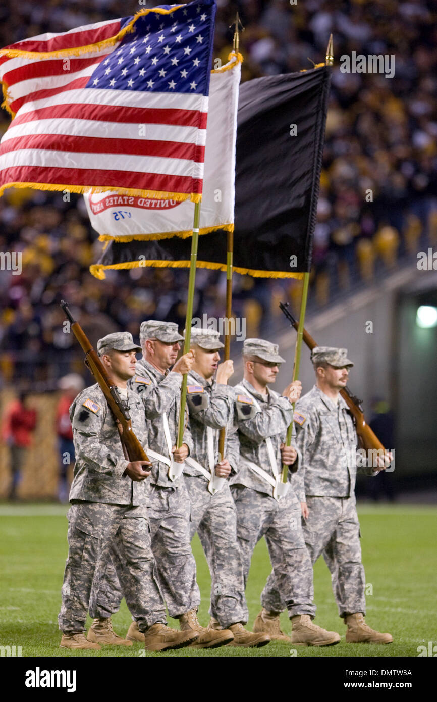 04 October 2009: The Color Guard leaves the field following the singing ...