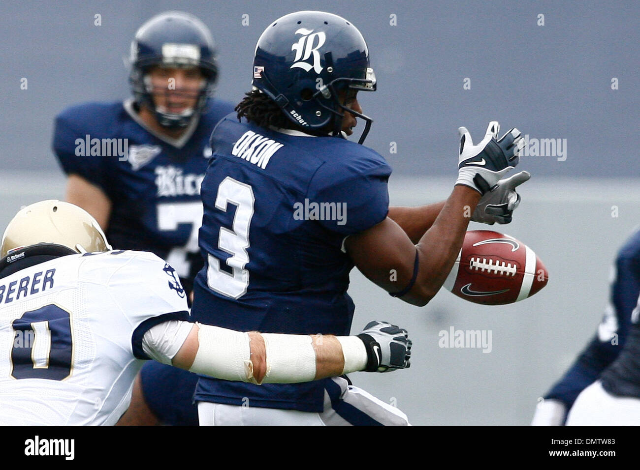 Toren Dixon (#3) of the Rice Owls has trouble keeping controlling a ...