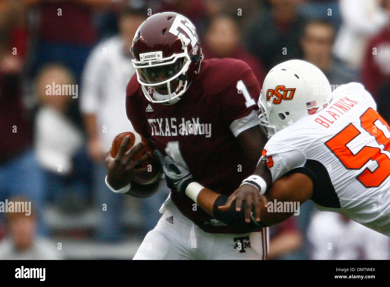 Jerrod Johnson (#1) of the Texas A&M University Aggies evades Jamie ...