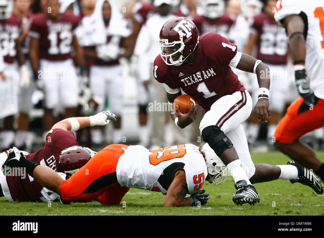 Jerrod Johnson (#1) of the Texas A&M University Aggies scrambles under ...