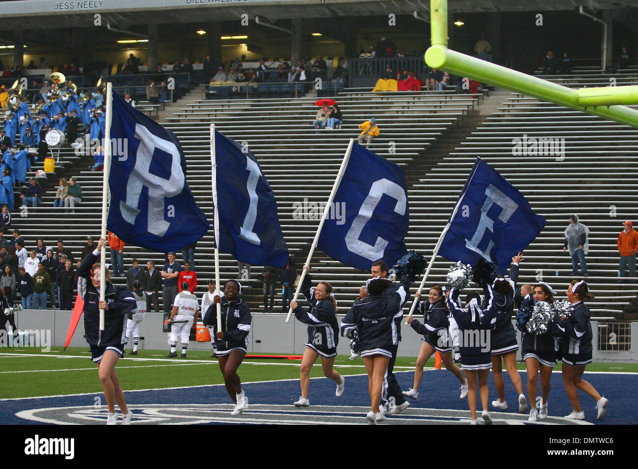The Rice Cheerleaders carry their flags in celebration after the Rice ...