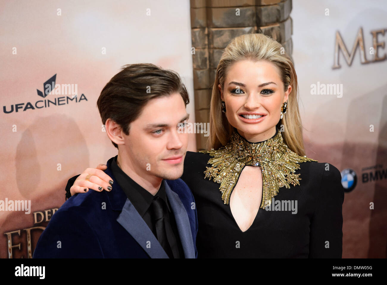 Berlin, Germany. 16th Dec, 2013. Actors Tom Payne and Emma Rigby attend ...