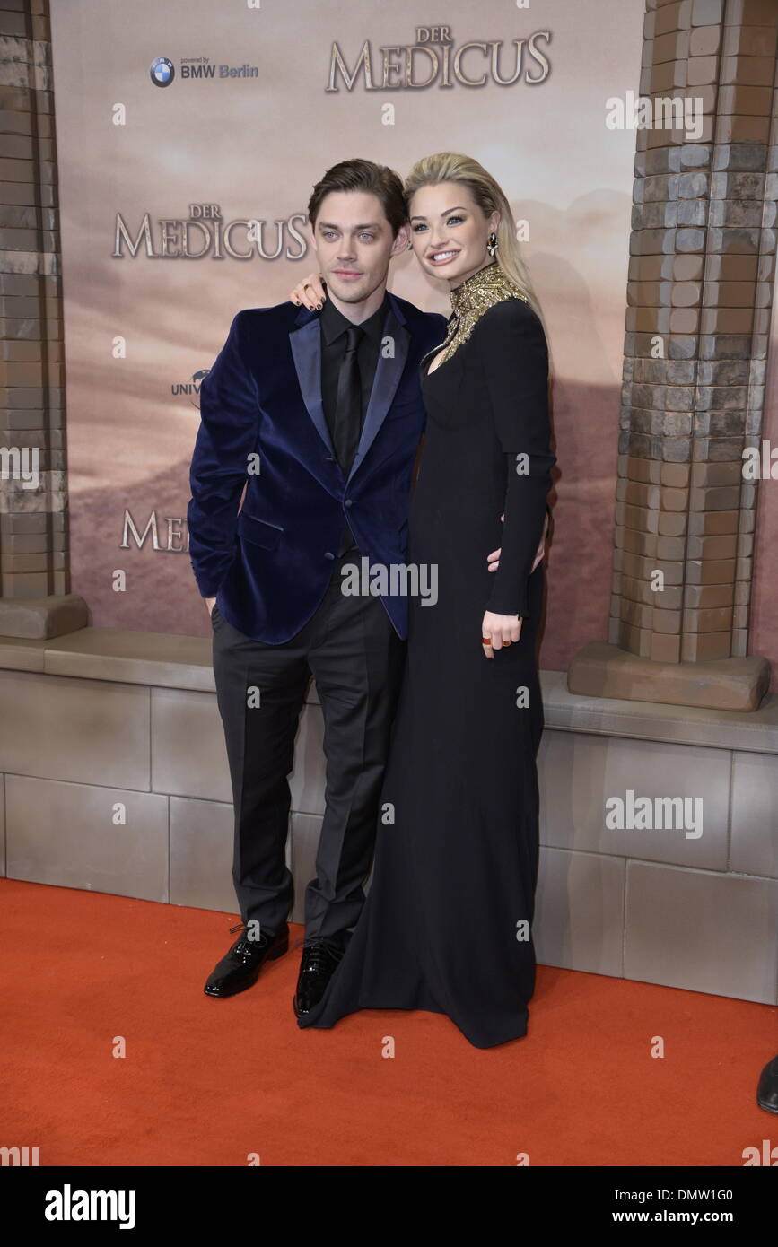 Berlin, Germany. 16th Dec, 2013. Actors Tom Payne and Emma Rigby attend ...