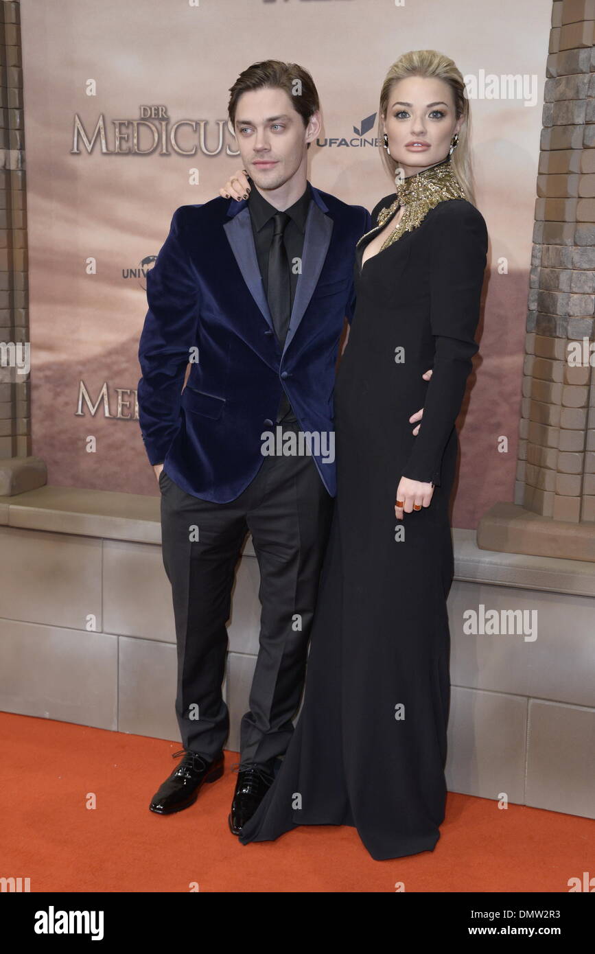 Berlin, Germany. 16th Dec, 2013. Actors Tom Payne and Emma Rigby attend ...