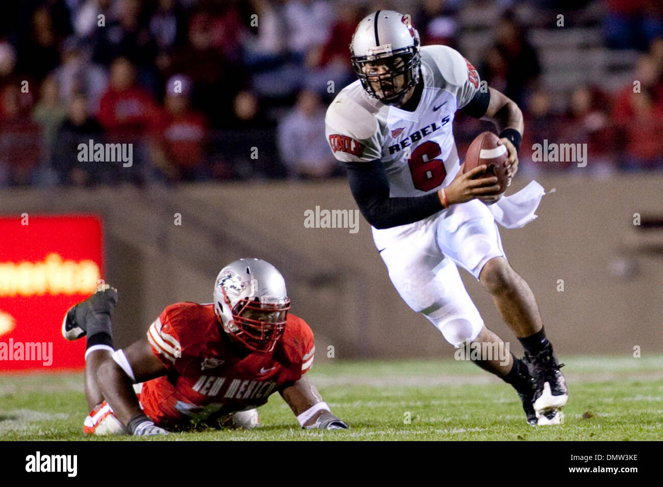 University of Northern Las Vegas quarterback Mike Clauson (6) makes a ...