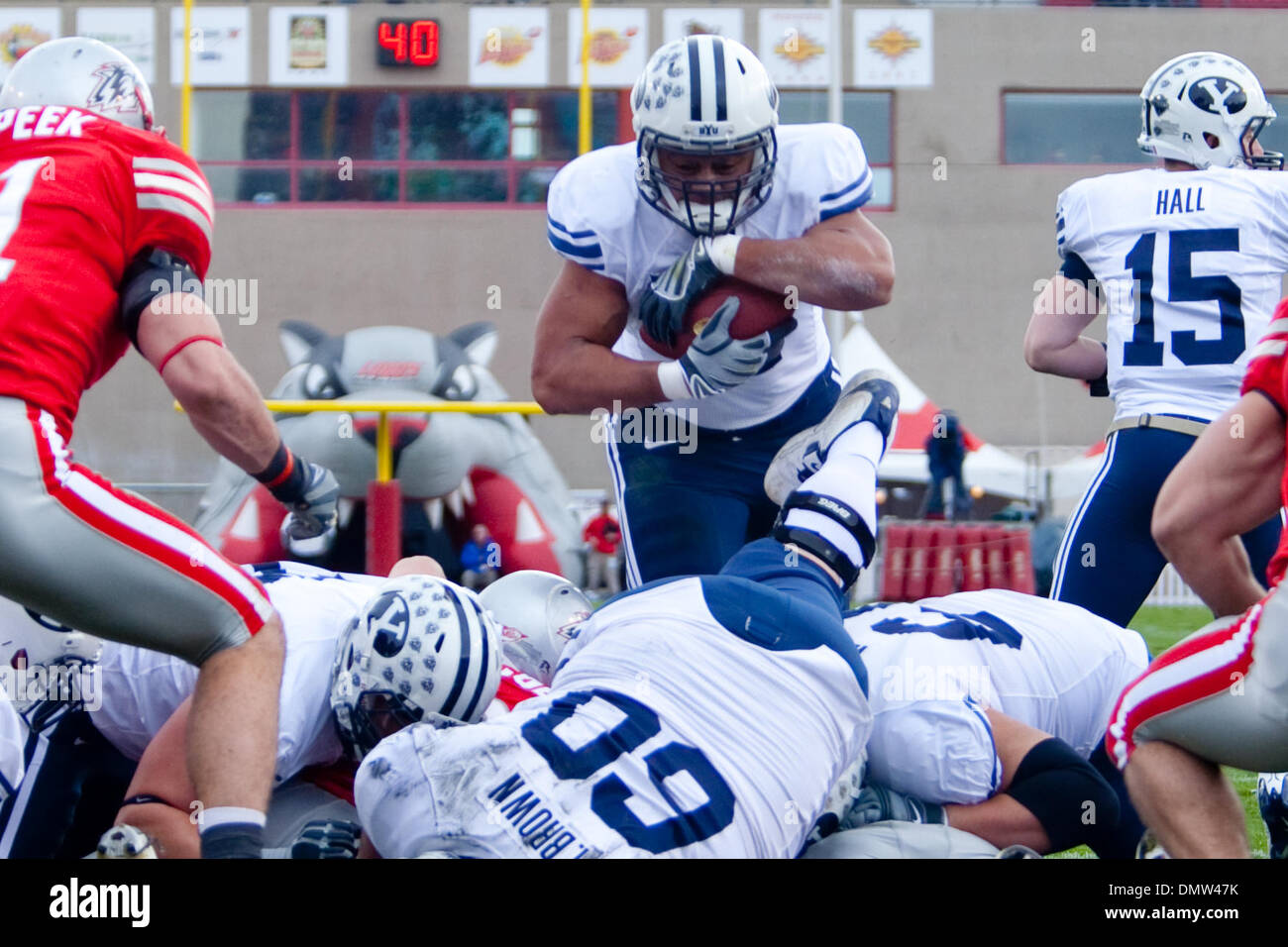 BYU Running Back Manase Tonga (11) leaps for the in zone. The ...