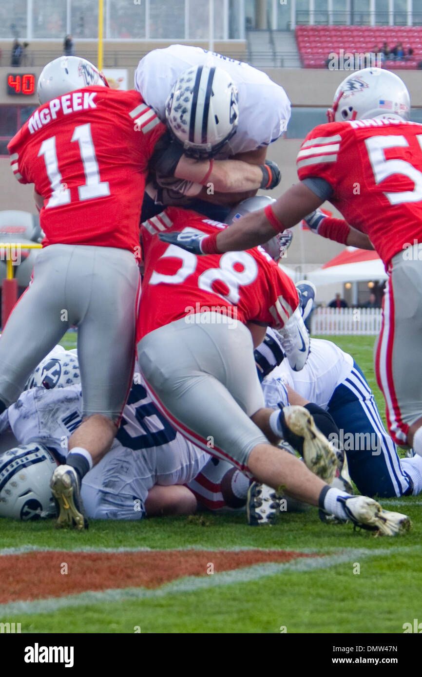 BYU Running Back Manase Tonga (11) leaps for the in zone while ...