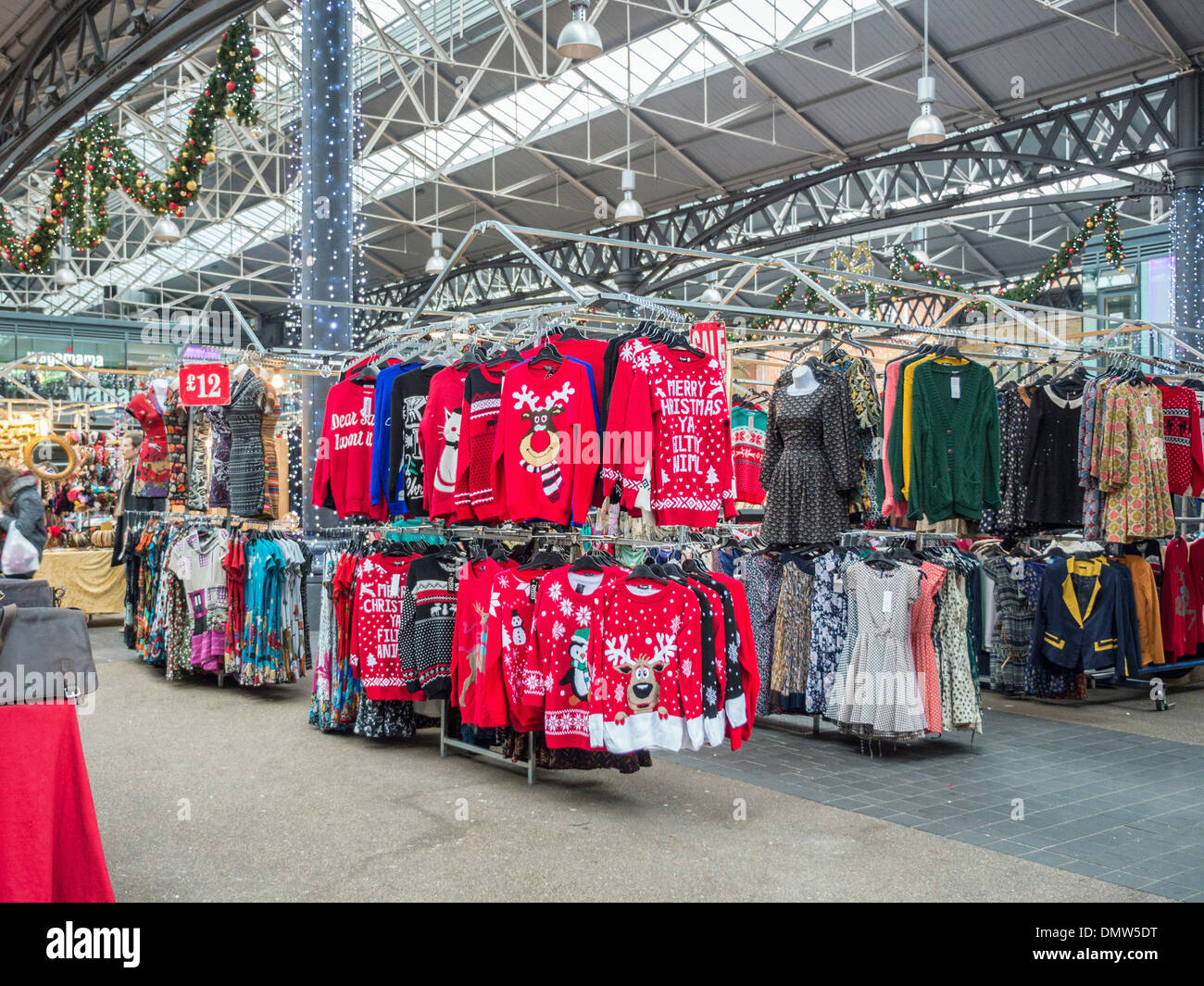 Old Spitalfields Market - stall selling red festive Christmas jerseys ...