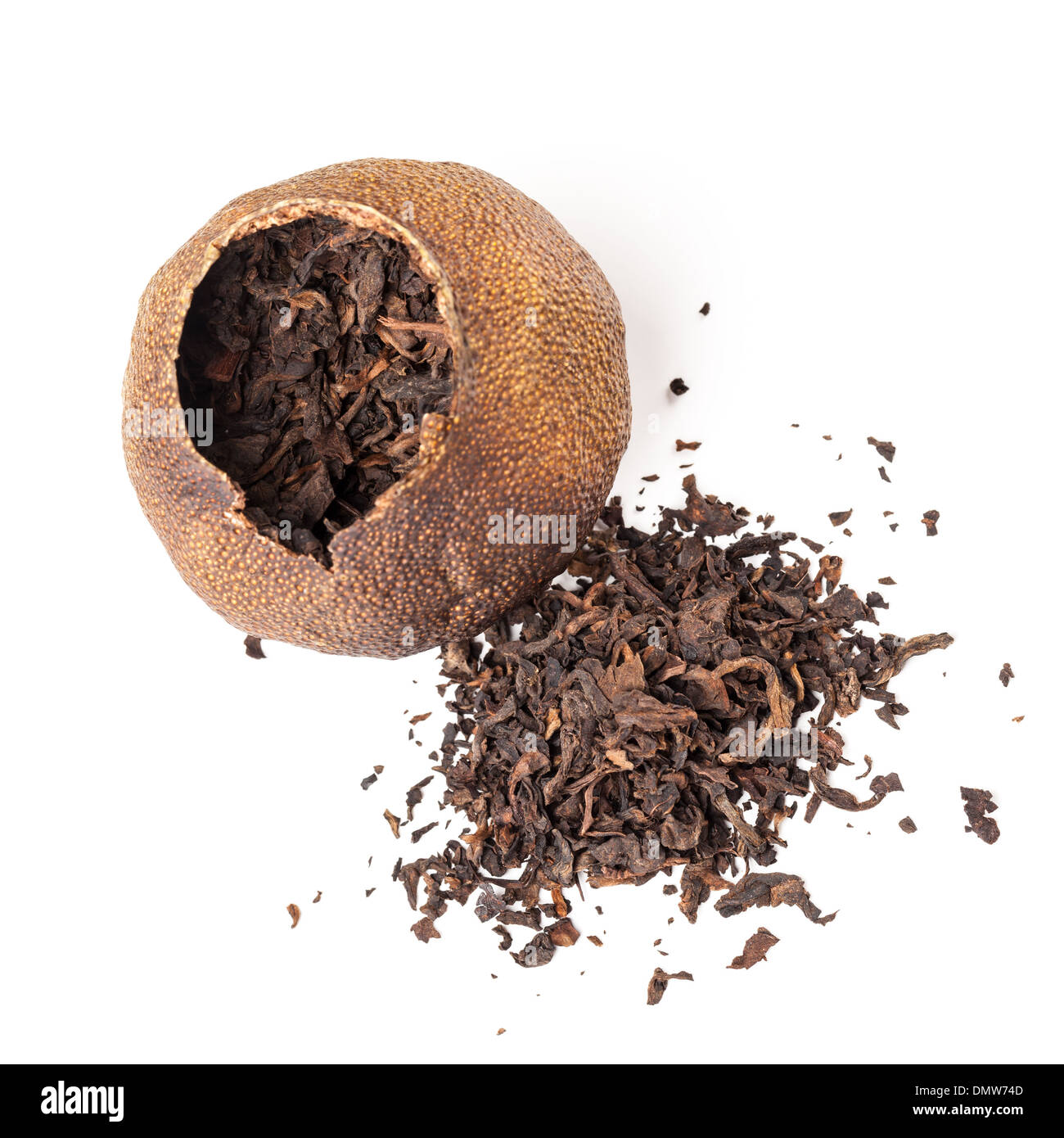 Chinese dark tea Pu-erh packed in dried mandarin peel isolated on white ...