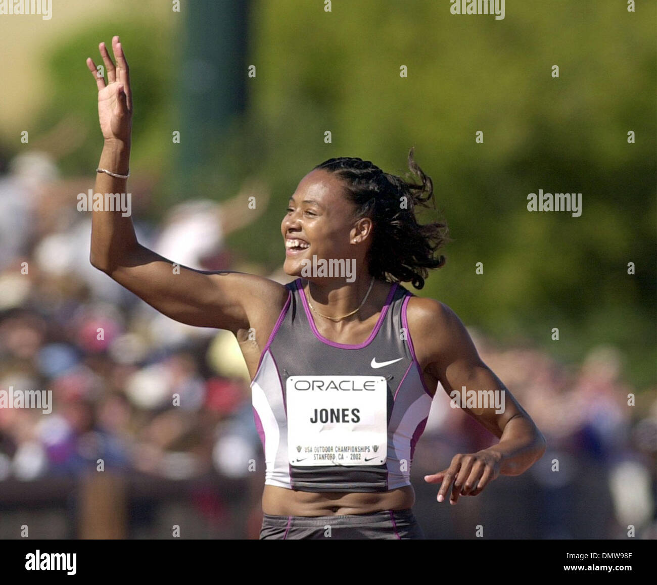 Jun 22, 2002; Stanford, CA, USA; Marion Jones celebrates after winning ...