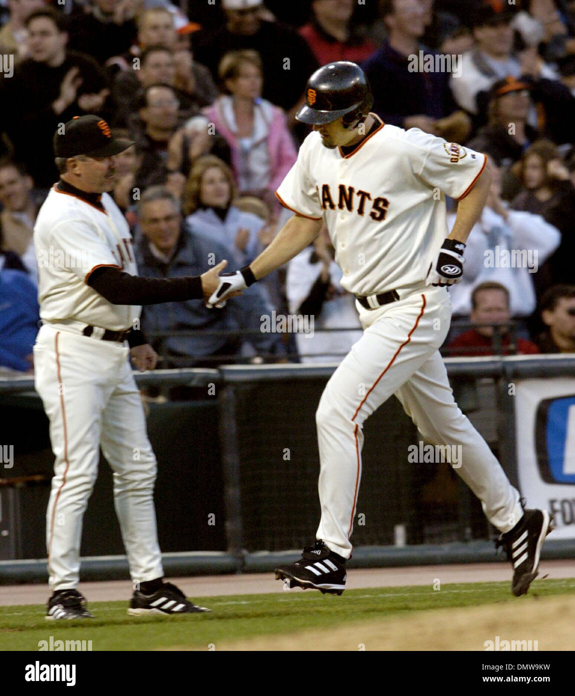 San Francisco Giants pitcher Jason Schmidt rounds the bases Wednesday ...