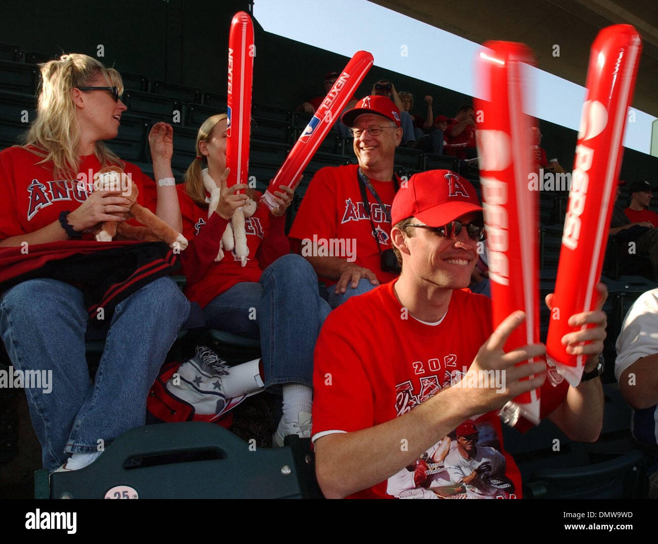 Oct 20, 2002 - Anaheim, CA, USA - Anaheim Angel fans bang their Thunder ...