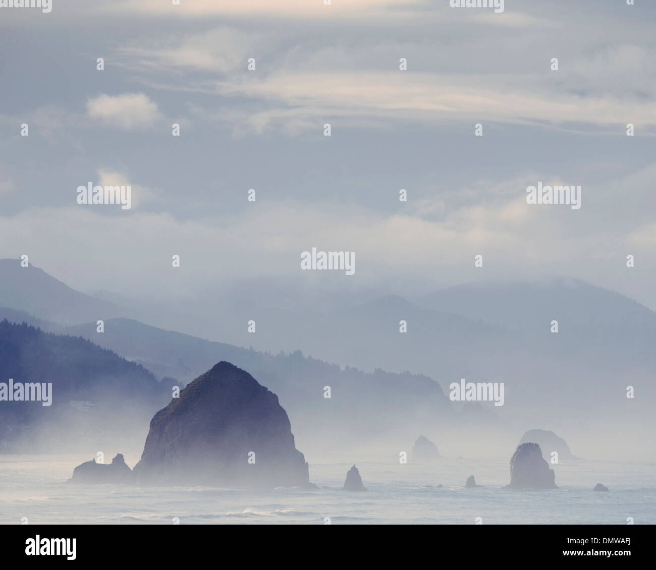 View of Haystack Rock at Cannon Beach and coast of Ecola State Park ...