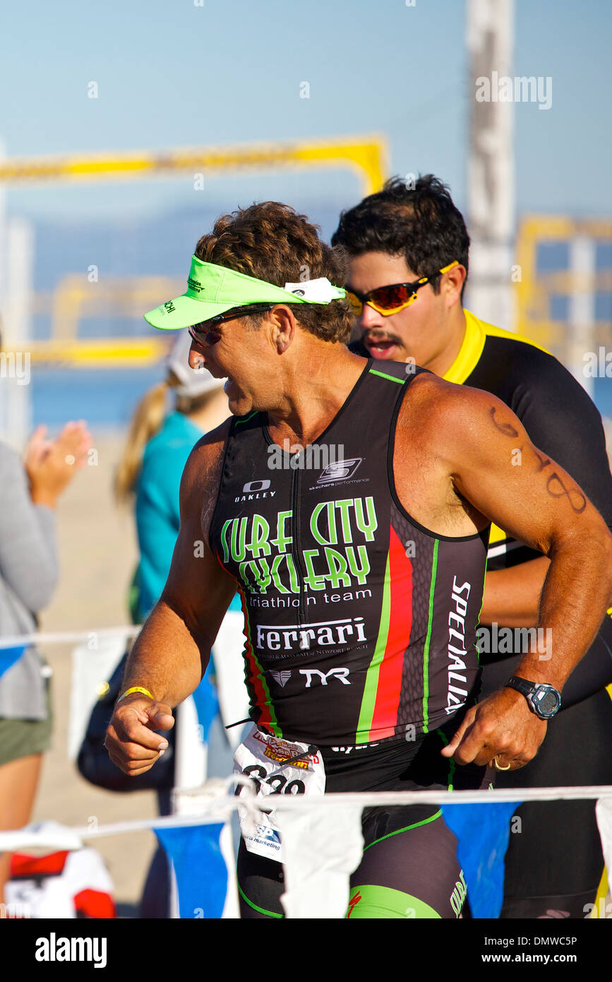 Male Athlete Approaching The Finish Line At The Hermosa Beach Triathlon ...