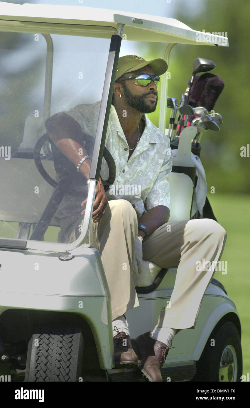 Jun 05, 2001; Los Altos, CA, USA; N.F.L. great Jerry Rice sits in his ...