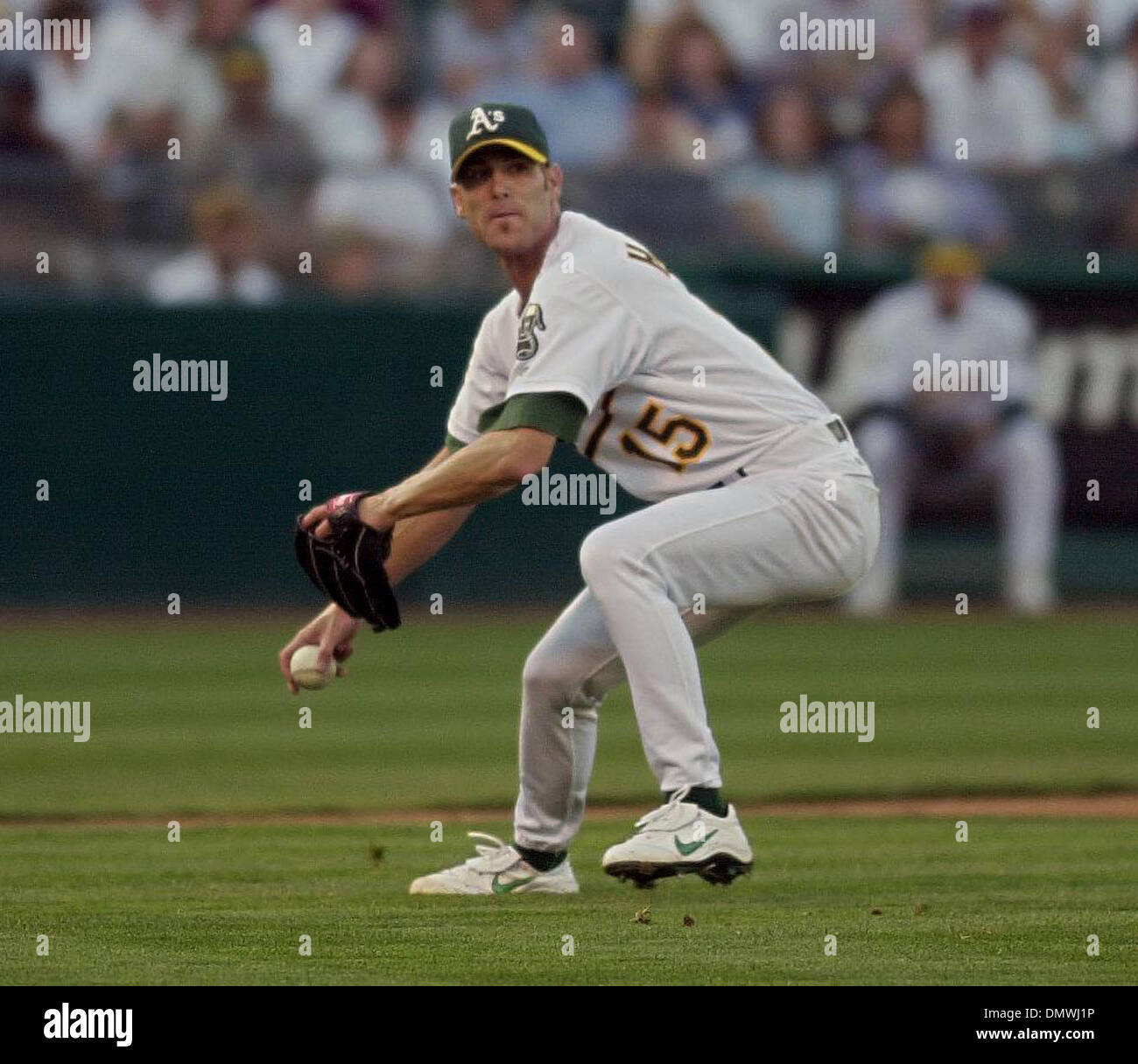 Jul 02, 2001; Oakland, CA, USA; A's pitcher Tim Hudson throws to 1st on ...